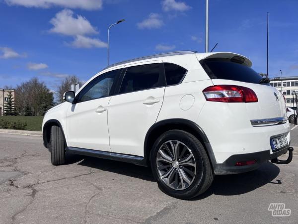 White Peugeot 4007 2012 in Siauliai, with an engine capacity of 1.60 L and mileage of 217 thousand km for 5999 €, photo 5 on AUTOMOTO.COM.LV