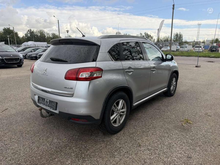 Pelēks Peugeot 4008 2013 Marijampole, ar dzinēja tilpumu 1.56 L un nobraukumu 277 tūkst. km par 4650 €, foto 6 vietnē AUTOMOTO.COM.LV