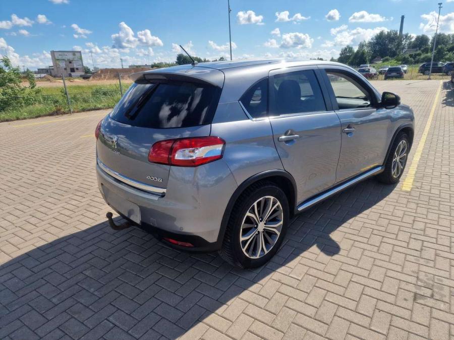 Grey Peugeot 4008 2015 in Taurage, with an engine capacity of 1.56 L and mileage of 252 thousand km for 5900 €, photo 7 on AUTOMOTO.COM.LV