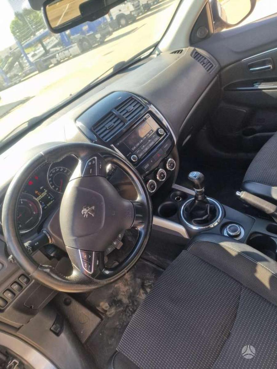 Grey Peugeot 4008 2015 in Taurage, with an engine capacity of 1.56 L and mileage of 252 thousand km for 5900 €, photo 17 on AUTOMOTO.COM.LV