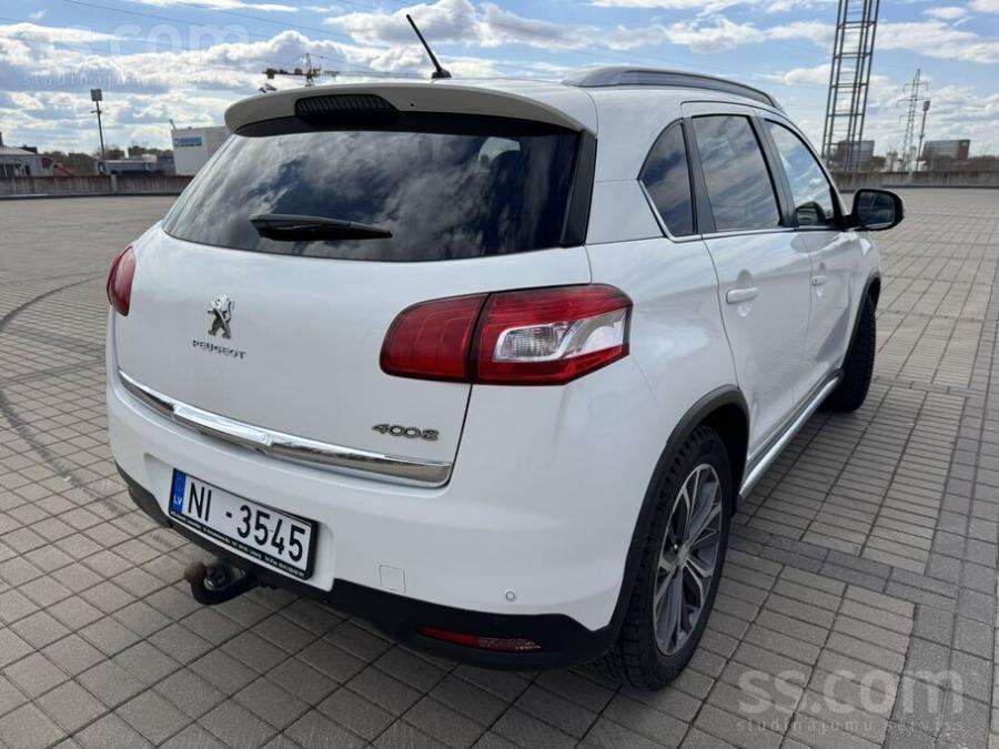 White Peugeot 4008 2013 in Riga, with an engine capacity of 1.80 L and mileage of 206 thousand km for 5300 €, photo 5 on AUTOMOTO.COM.LV