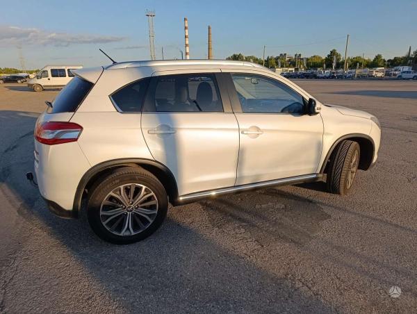 White Peugeot 4008 2013 in Panevezys, with an engine capacity of 1.80 L and mileage of 228 thousand km for 5850 €, photo 4 on AUTOMOTO.COM.LV