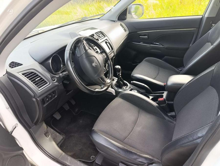 Balts Peugeot 4008 2013 Panevēža, ar dzinēja tilpumu 1.80 L un nobraukumu 236 tūkst. km par 5650 €, foto 12 vietnē AUTOMOTO.COM.LV