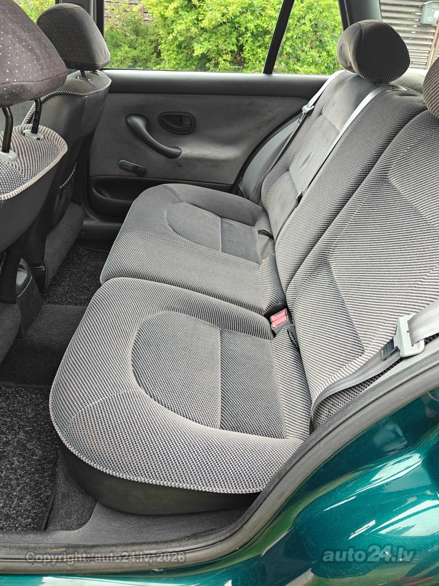 Green Peugeot 406 1997 in Tallinn, with an engine capacity of 1.90 L and mileage of 194 thousand km for 3395 €, photo 9 on AUTOMOTO.COM.LV