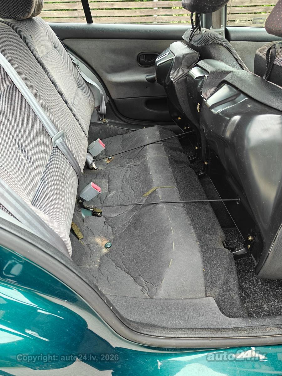 Green Peugeot 406 1997 in Tallinn, with an engine capacity of 1.90 L and mileage of 194 thousand km for 3395 €, photo 23 on AUTOMOTO.COM.LV