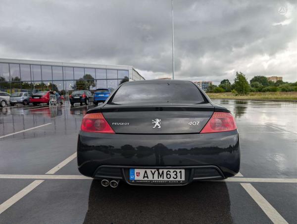 Black Peugeot 407 2006 in Panevezys, with an engine capacity of 2.23 L and mileage of 276 thousand km for 1600 €, photo 5 on AUTOMOTO.COM.LV