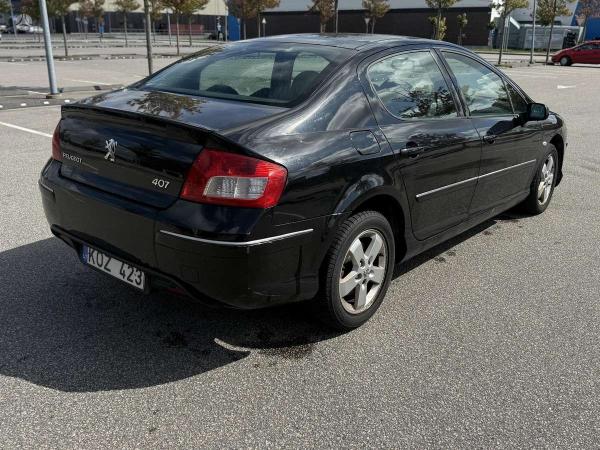 Black Peugeot 407 2009 in Klaipeda, with an engine capacity of 2.00 L and mileage of 305 thousand km for 1200 €, photo 5 on AUTOMOTO.COM.LV