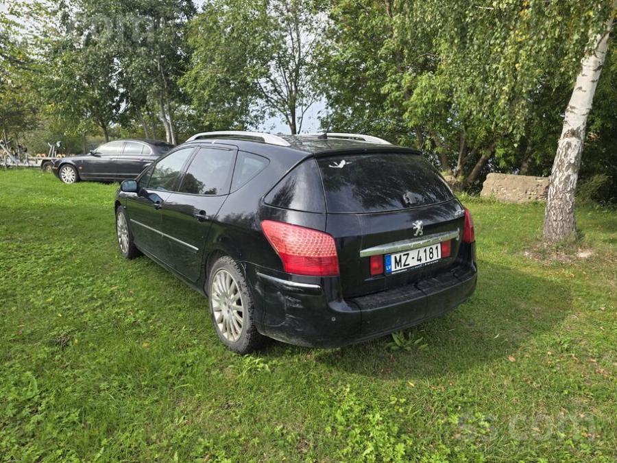 Melns Peugeot 407 2009 Rīga, ar dzinēja tilpumu 2.20 L un nobraukumu 353 tūkst. km par 1000 €, foto 13 vietnē AUTOMOTO.COM.LV