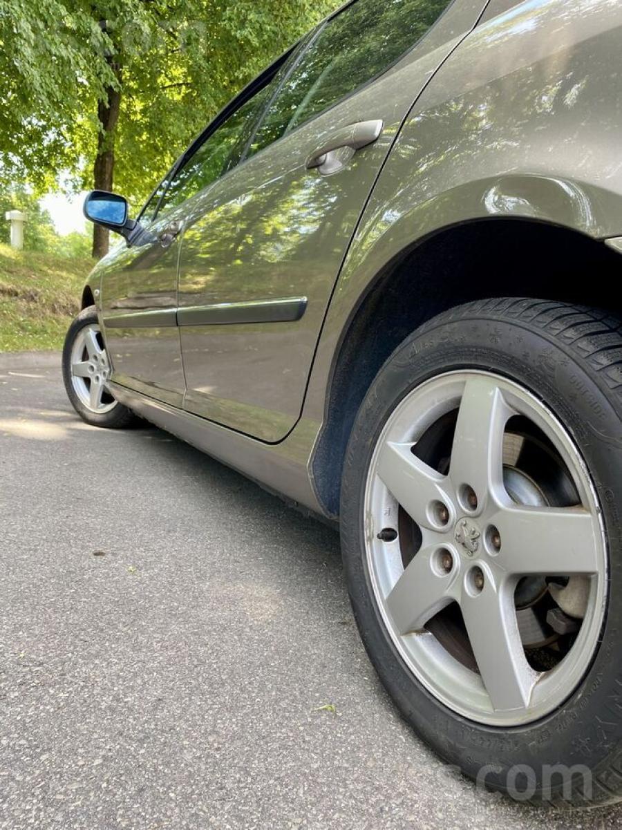 Brown Peugeot 407 2007 in Riga, with an engine capacity of 2.00 L and mileage of 125 thousand km for 2600 €, photo 6 on AUTOMOTO.COM.LV