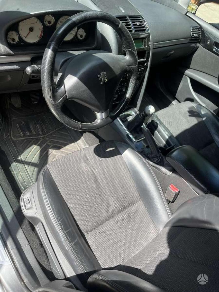 Grey Peugeot 407 2008 in Vilnius, with an engine capacity of 2.18 L and mileage of 261 thousand km for 950 €, photo 13 on AUTOMOTO.COM.LV