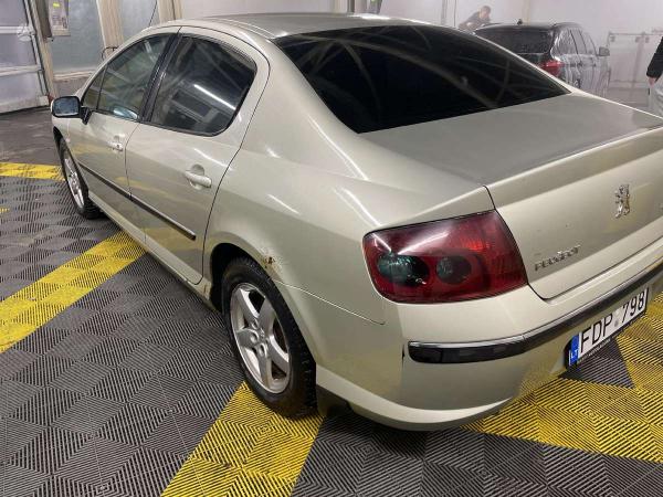 Yellow Peugeot 407 2007 in Siauliai, with an engine capacity of 2.00 L and mileage of 315 thousand km for 999 €, photo 3 on AUTOMOTO.COM.LV