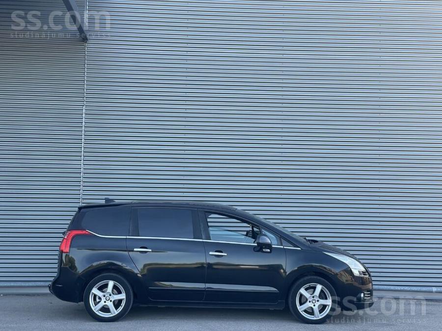 Black Peugeot 5008 2010 in Riga, with an engine capacity of 2.00 L and mileage of 263 thousand km for 4750 €, photo 6 on AUTOMOTO.COM.LV