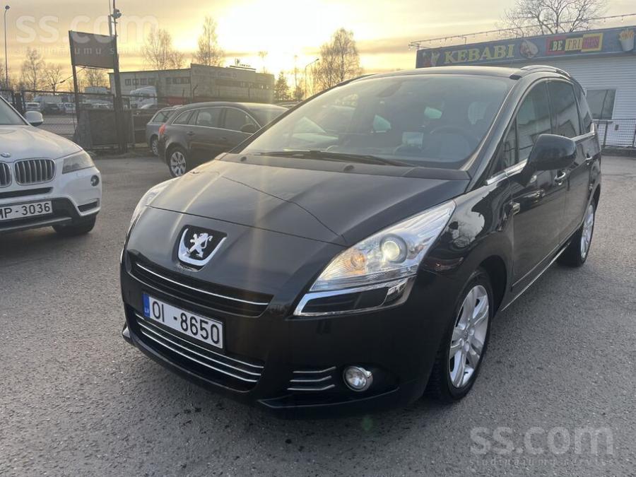 Black Peugeot 5008 2012 in Riga, with an engine capacity of 2.00 L and mileage of 0 thousand km for 4990 €, photo 3 on AUTOMOTO.COM.LV