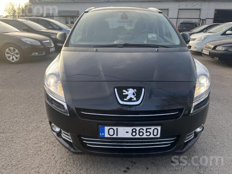 Black Peugeot 5008 2012 in Riga, with an engine capacity of 2.00 L and mileage of 0 thousand km for 4990 €, photo 4 on AUTOMOTO.COM.LV