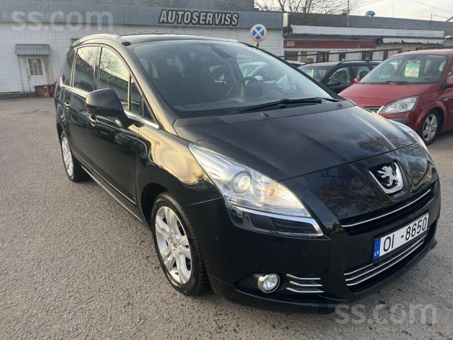 Black Peugeot 5008 2012 in Riga, with an engine capacity of 2.00 L and mileage of 0 thousand km for 4990 €, photo 5 on AUTOMOTO.COM.LV