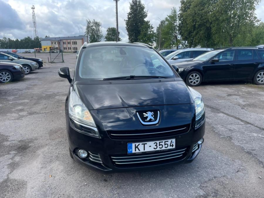 Black Peugeot 5008 2013 in Riga, with an engine capacity of 2.00 L and mileage of 340 thousand km for 6350 €, photo 12 on AUTOMOTO.COM.LV