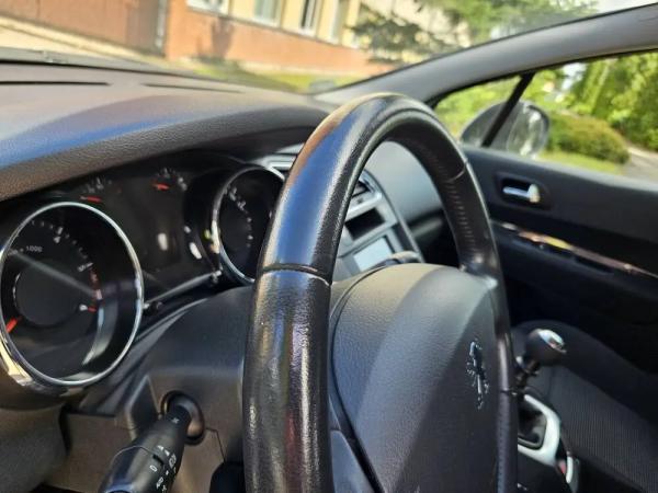 Blue Peugeot 5008 2009 in Jekabpils, with an engine capacity of 2.00 L and mileage of 191 thousand km for 4890 €, photo 10 on AUTOMOTO.COM.LV