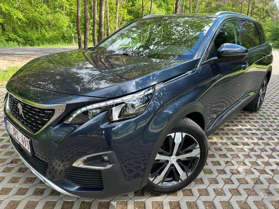 Blue Peugeot 5008 2018 in Vilnius, with an engine capacity of 1.20 L and mileage of 185 thousand km for 8999 €, photo 3 on AUTOMOTO.COM.LV