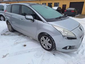 Grey Peugeot 5008 2010 in Marijampole, with an engine capacity of 2.00 L and mileage of 199 thousand km for 3950 €, photo 3 on AUTOMOTO.COM.LV