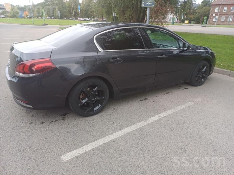Black Peugeot 508 2015 in Riga, with an engine capacity of 2.00 L and mileage of 255 thousand km for 6000 €, photo 4 on AUTOMOTO.COM.LV