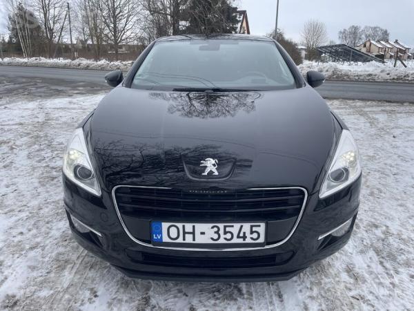 Black Peugeot 508 2013 in Riga, with an engine capacity of 2.00 L and mileage of 269 thousand km for 4890 €, photo 8 on AUTOMOTO.COM.LV
