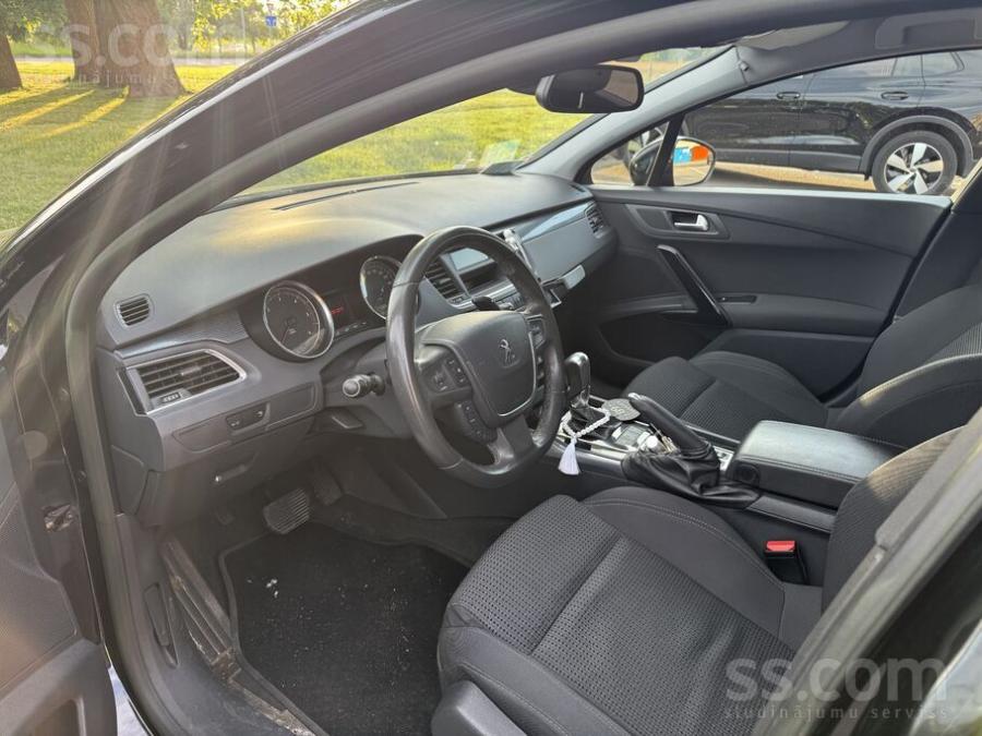 Black Peugeot 508 2013 in Riga, with an engine capacity of 2.00 L and mileage of 197 thousand km for 2700 €, photo 9 on AUTOMOTO.COM.LV
