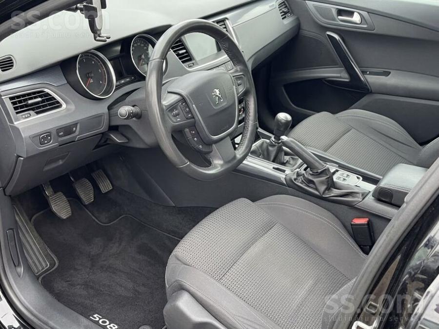 Black Peugeot 508 2013 in Riga, with an engine capacity of 2.00 L and mileage of 270 thousand km for 3200 €, photo 13 on AUTOMOTO.COM.LV