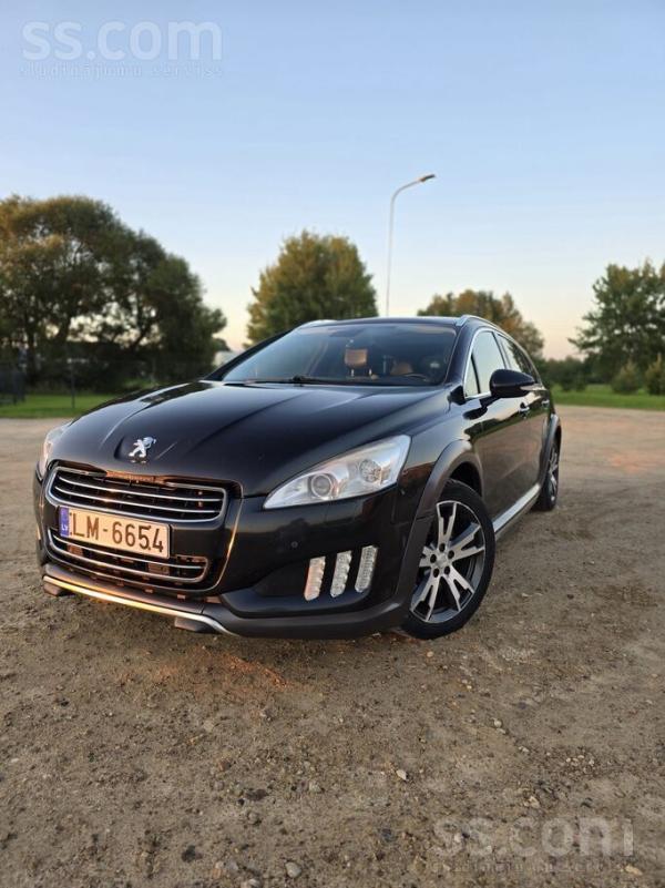 Black Peugeot 508 2013 in Riga, with an engine capacity of 2.00 L and mileage of 300 thousand km for 6900 €, photo 2 on AUTOMOTO.COM.LV