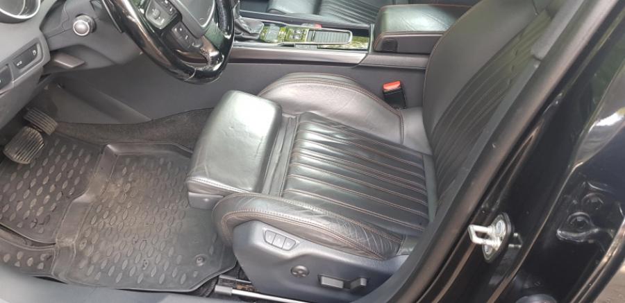 Black Peugeot 508 2015 in Riga, with an engine capacity of 2.00 L and mileage of 238 thousand km for 9750 €, photo 18 on AUTOMOTO.COM.LV