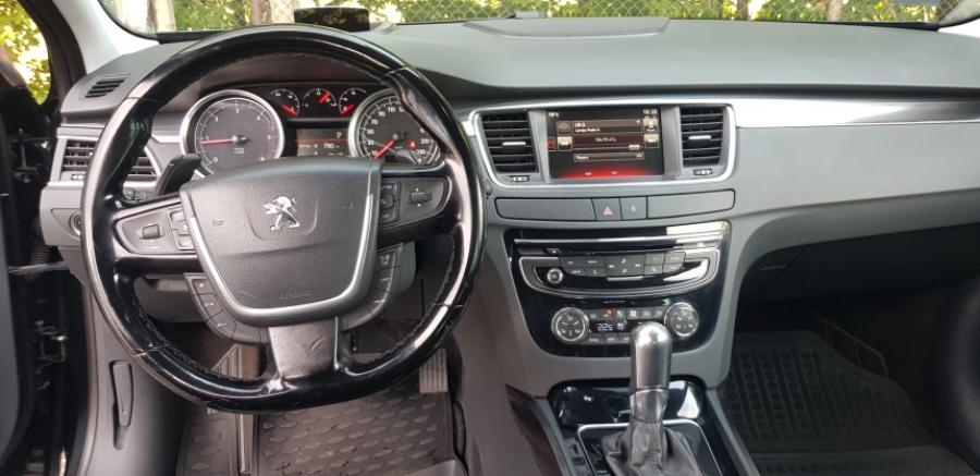 Black Peugeot 508 2015 in Riga, with an engine capacity of 2.00 L and mileage of 238 thousand km for 9750 €, photo 21 on AUTOMOTO.COM.LV