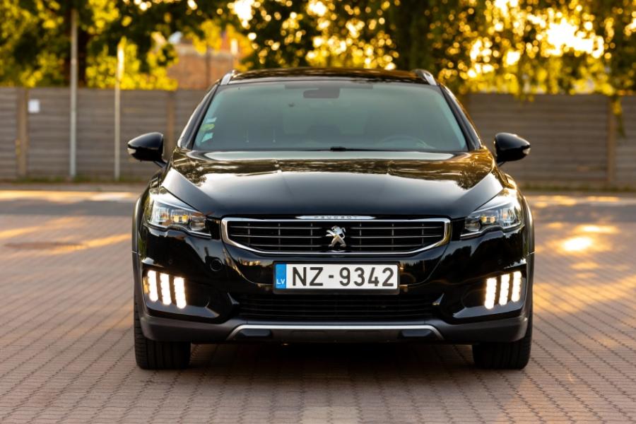 Black Peugeot 508 2016 in Riga, with an engine capacity of 2.00 L and mileage of 241 thousand km for 11990 €, photo 6 on AUTOMOTO.COM.LV