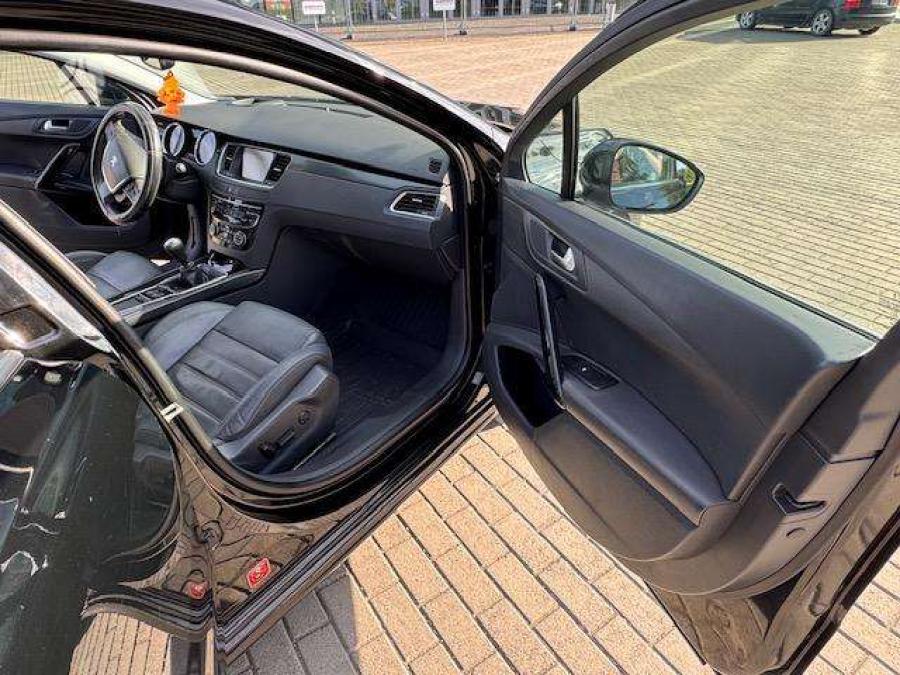 Black Peugeot 508 2016 in Siauliai, with an engine capacity of 2.00 L and mileage of 291 thousand km for 6200 €, photo 11 on AUTOMOTO.COM.LV