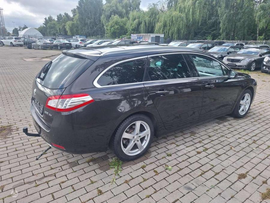Brown Peugeot 508 2011 in Marijampole, with an engine capacity of 2.18 L and mileage of 251 thousand km for 4700 €, photo 7 on AUTOMOTO.COM.LV