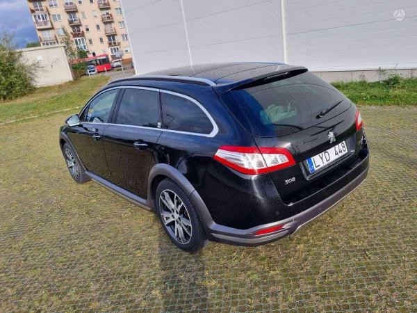 Black Peugeot 508 RXH 2013 in Vilnius, with an engine capacity of 2.00 L and mileage of 290 thousand km for 2500 €, photo 2 on AUTOMOTO.COM.LV