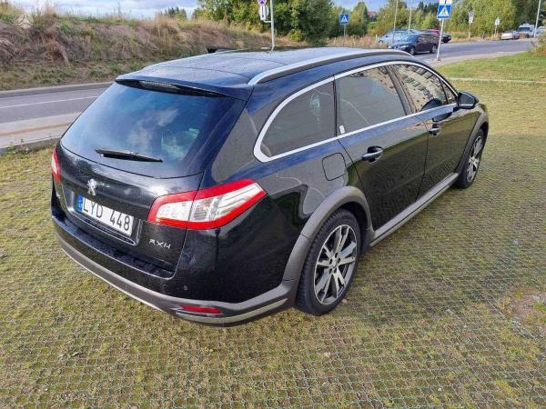 Black Peugeot 508 RXH 2013 in Vilnius, with an engine capacity of 2.00 L and mileage of 290 thousand km for 2500 €, photo 3 on AUTOMOTO.COM.LV