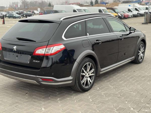 Black Peugeot 508 RXH 2014 in Taurage, with an engine capacity of 2.00 L and mileage of 265 thousand km for 5999 €, photo 7 on AUTOMOTO.COM.LV