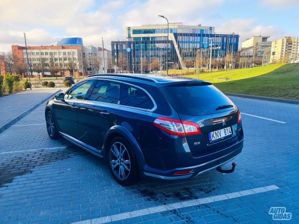 Black Peugeot 508 RXH 2014 in Vilnius, with an engine capacity of 2.00 L and mileage of 269 thousand km for 5100 €, photo 2 on AUTOMOTO.COM.LV
