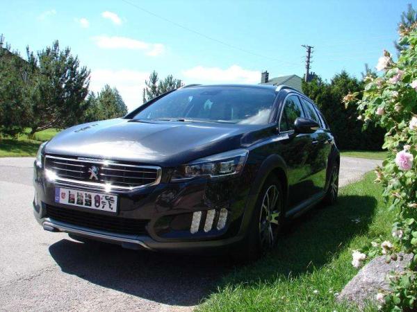 Black Peugeot 508 RXH 2014 in Panevezys, with an engine capacity of 2.00 L and mileage of 285 thousand km for 7500 €, photo 2 on AUTOMOTO.COM.LV