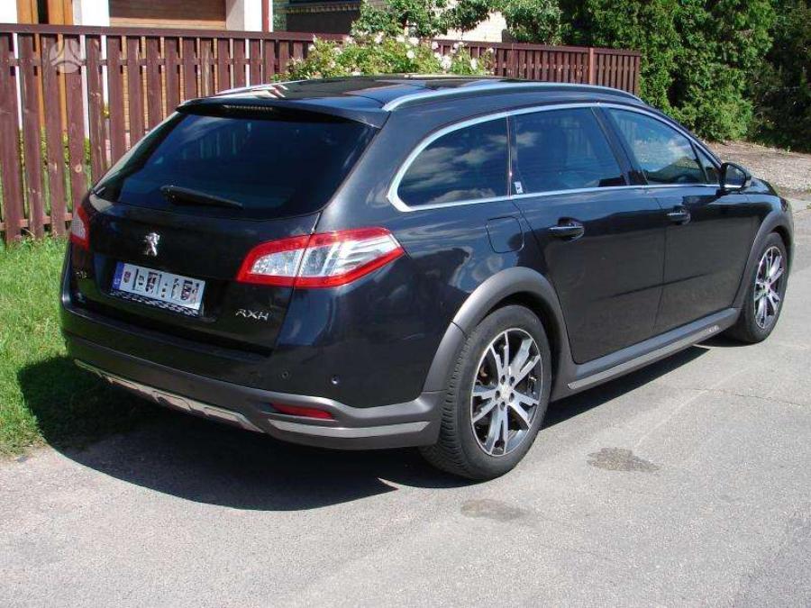 Black Peugeot 508 RXH 2014 in Panevezys, with an engine capacity of 2.00 L and mileage of 285 thousand km for 7500 €, photo 4 on AUTOMOTO.COM.LV
