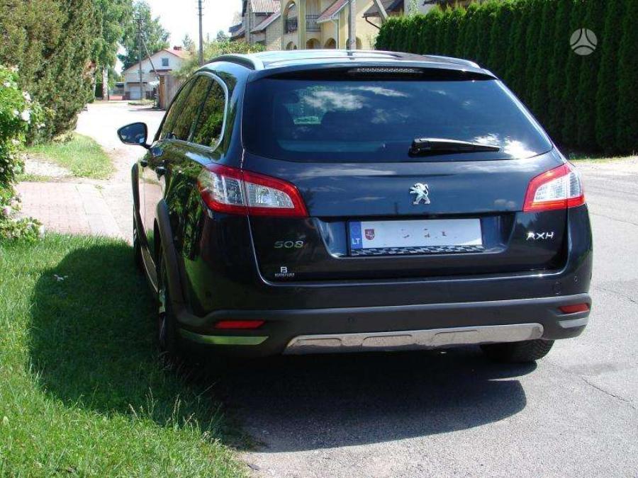 Black Peugeot 508 RXH 2014 in Panevezys, with an engine capacity of 2.00 L and mileage of 285 thousand km for 7500 €, photo 5 on AUTOMOTO.COM.LV