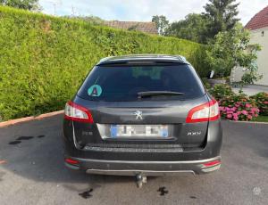 Black Peugeot 508 RXH 2016 in Taurage, with an engine capacity of 2.00 L and mileage of 239 thousand km for 5500 €, photo 4 on AUTOMOTO.COM.LV