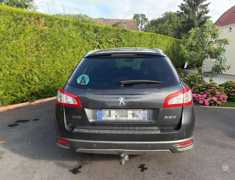 Black Peugeot 508 RXH 2016 in Taurage, with an engine capacity of 2.00 L and mileage of 239 thousand km for 5500 €, photo 4 on AUTOMOTO.COM.LV