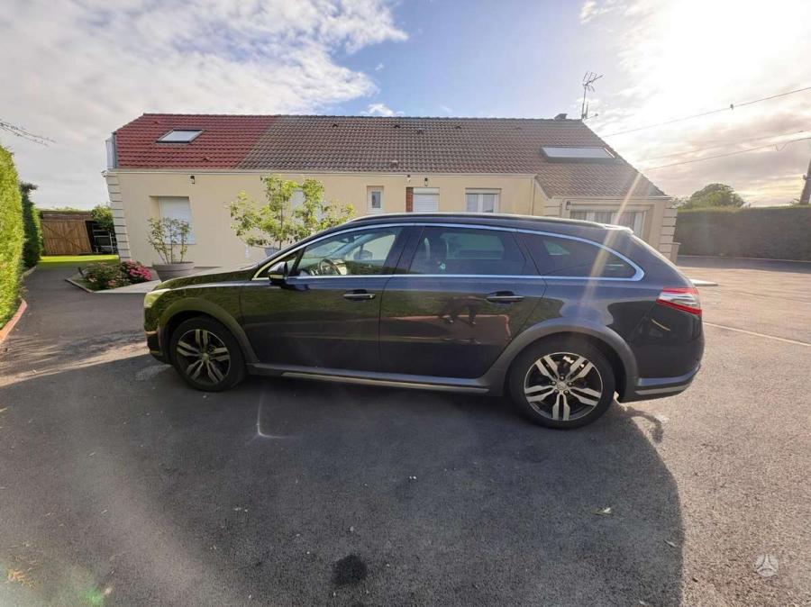 Black Peugeot 508 RXH 2016 in Taurage, with an engine capacity of 2.00 L and mileage of 239 thousand km for 5500 €, photo 5 on AUTOMOTO.COM.LV