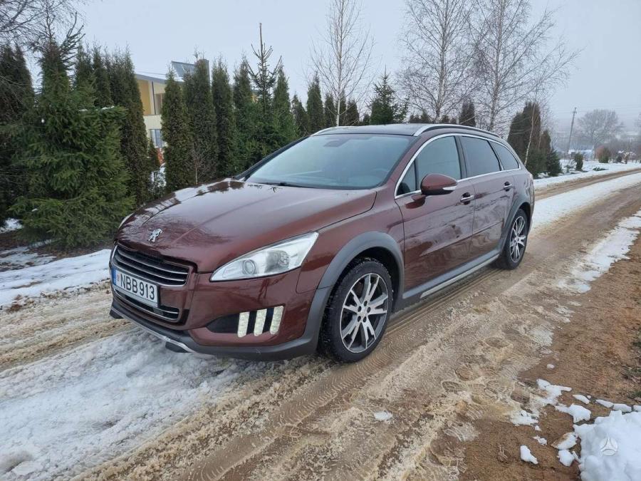 Brown Peugeot 508 RXH 2013 in Alytus, with an engine capacity of 2.20 L and mileage of 268 thousand km for 6420 €, photo 2 on AUTOMOTO.COM.LV