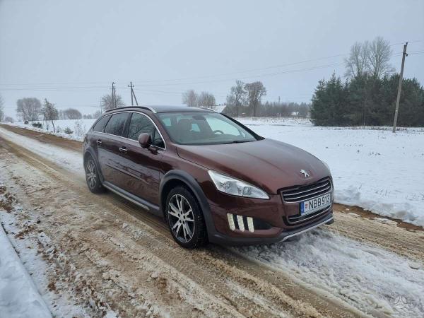 Brown Peugeot 508 RXH 2013 in Alytus, with an engine capacity of 2.20 L and mileage of 268 thousand km for 6420 €, photo 4 on AUTOMOTO.COM.LV