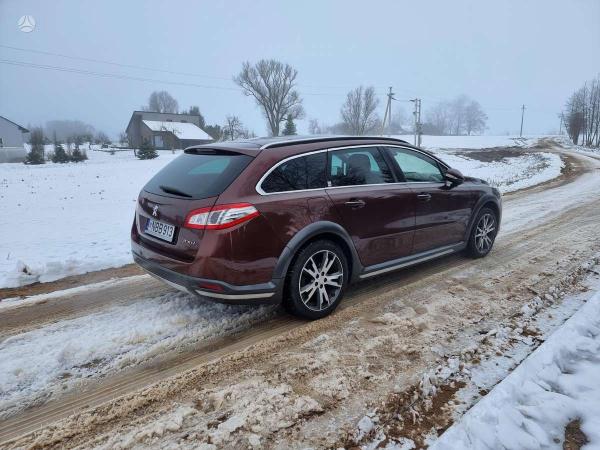 Brown Peugeot 508 RXH 2013 in Alytus, with an engine capacity of 2.20 L and mileage of 268 thousand km for 6420 €, photo 6 on AUTOMOTO.COM.LV