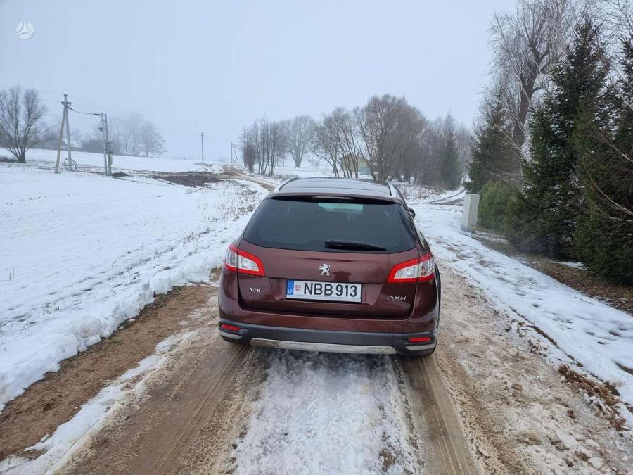 Brown Peugeot 508 RXH 2013 in Alytus, with an engine capacity of 2.20 L and mileage of 268 thousand km for 6420 €, photo 7 on AUTOMOTO.COM.LV