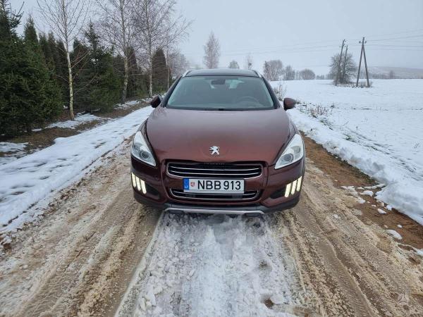 Brown Peugeot 508 RXH 2013 in Alytus, with an engine capacity of 2.00 L and mileage of 268 thousand km for 6420 €, photo 3 on AUTOMOTO.COM.LV