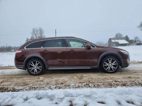 Brown Peugeot 508 RXH 2013 in Alytus, with an engine capacity of 2.00 L and mileage of 268 thousand km for 6420 €, photo 5 on AUTOMOTO.COM.LV