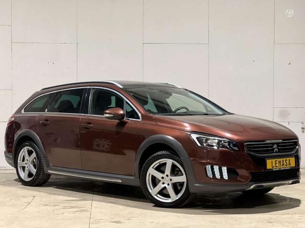 Brown Peugeot 508 RXH 2014 in Klaipeda, with an engine capacity of 2.00 L and mileage of 245 thousand km for 8888 €, photo 3 on AUTOMOTO.COM.LV